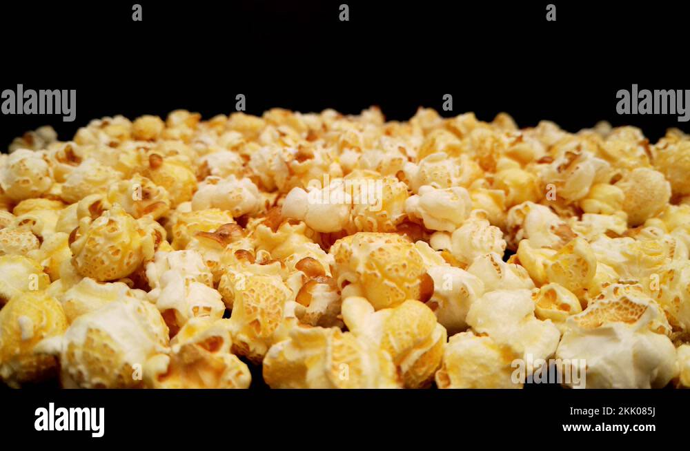 Freshly popped popcorn - close up shot Stock Video Footage - Alamy