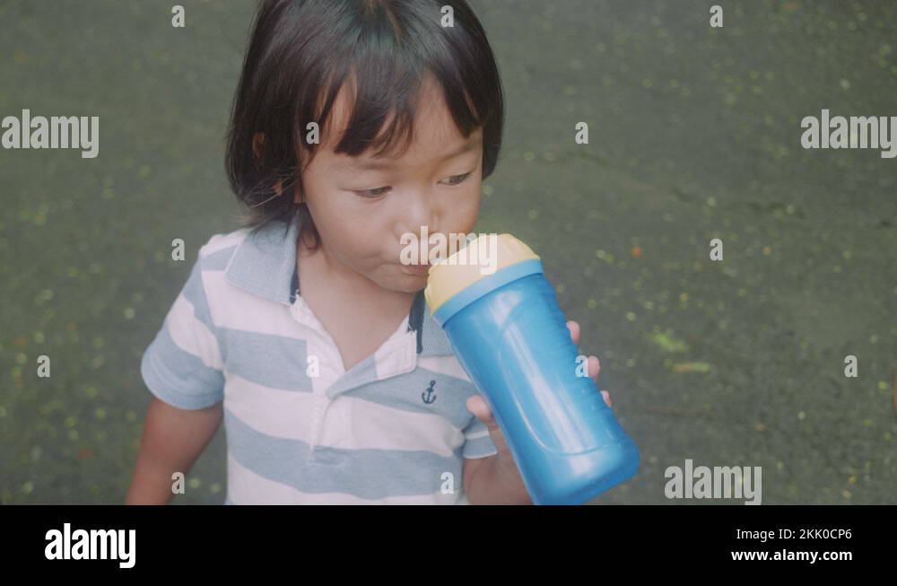 A boy drinking from a flask Stock Videos & Footage - HD and 4K Video ...