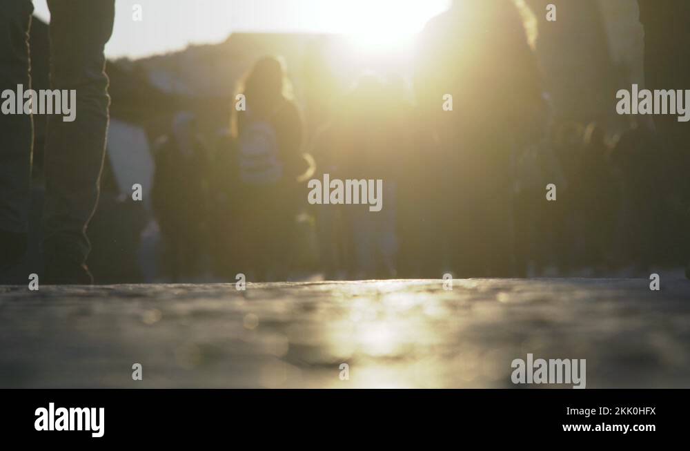 people silhouettes wander along ancient pavement Stock Video Footage ...