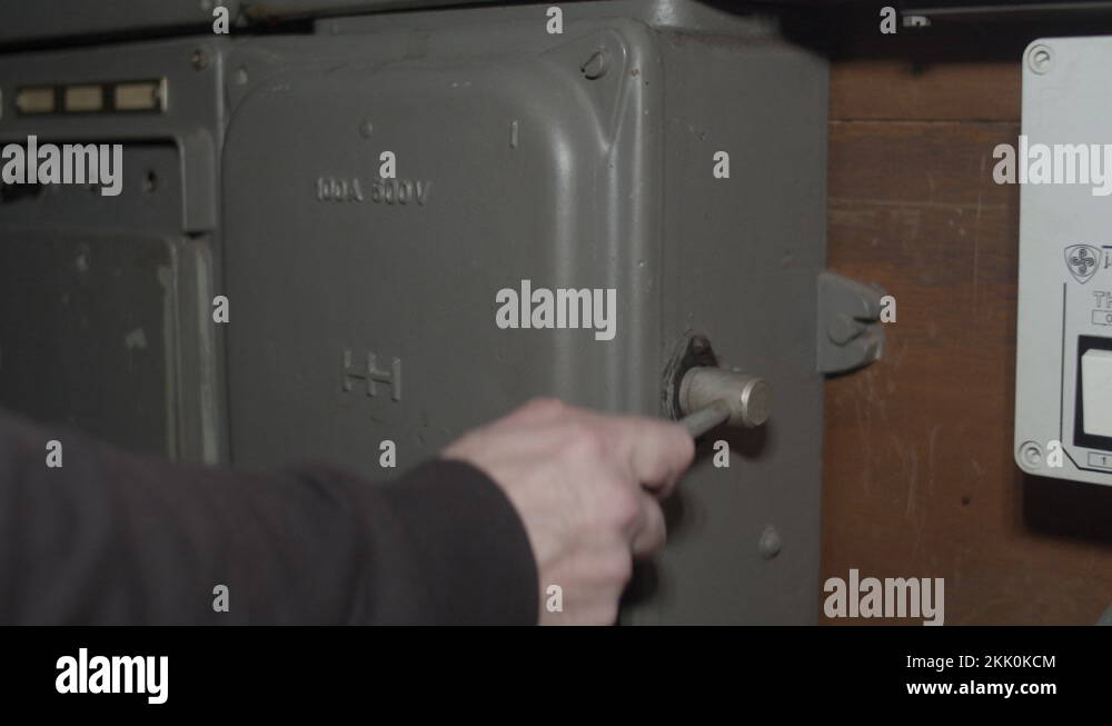Hand switching old lever and turning on lights in old room Stock Video ...