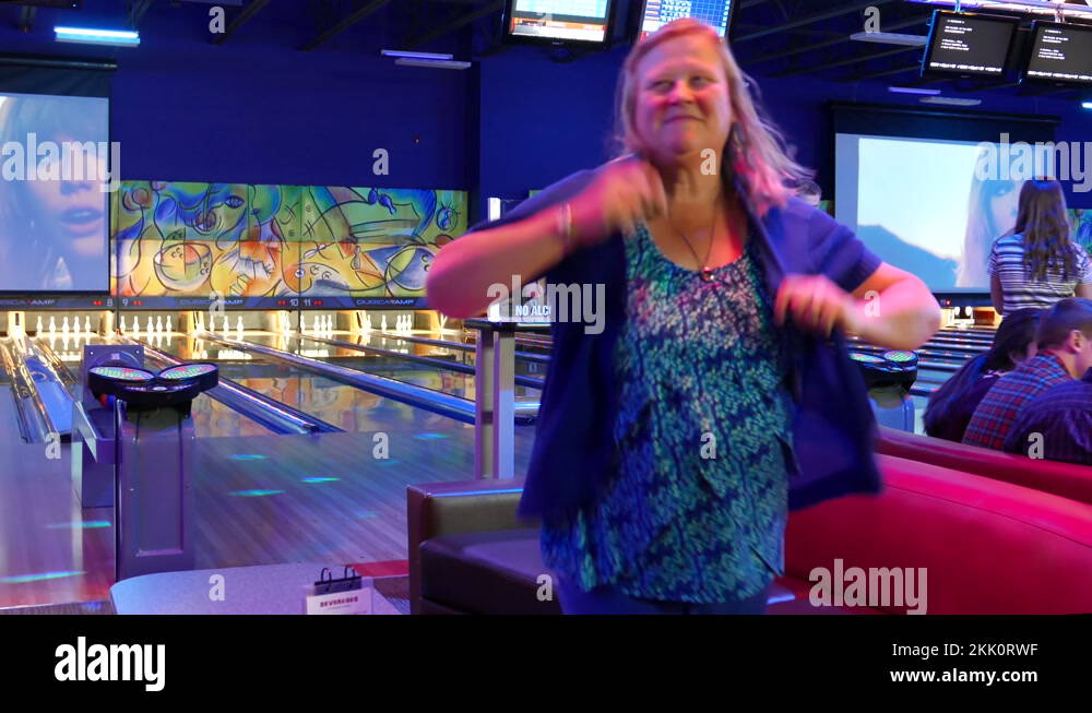 People playing bowling in a bowling saloon with 4k resolution Stock ...