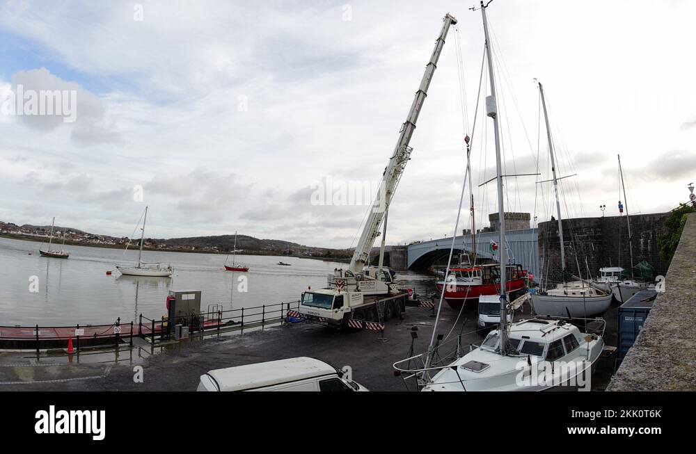 Mobile crane lifting fishing boat Stock Videos & Footage - HD and 4K ...