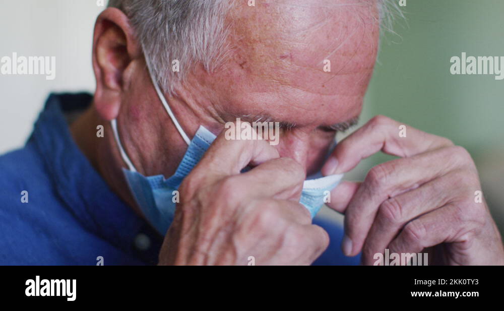 Adjusting mask Stock Videos & Footage - HD and 4K Video Clips - Alamy