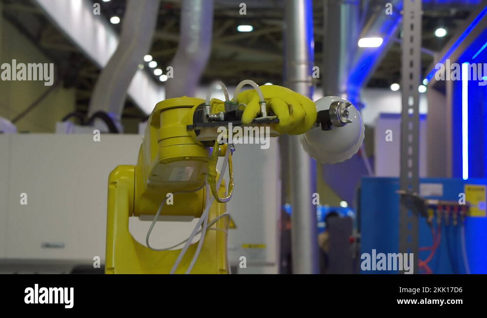 Demonstration of coloring an object using a robotic arm of a ...