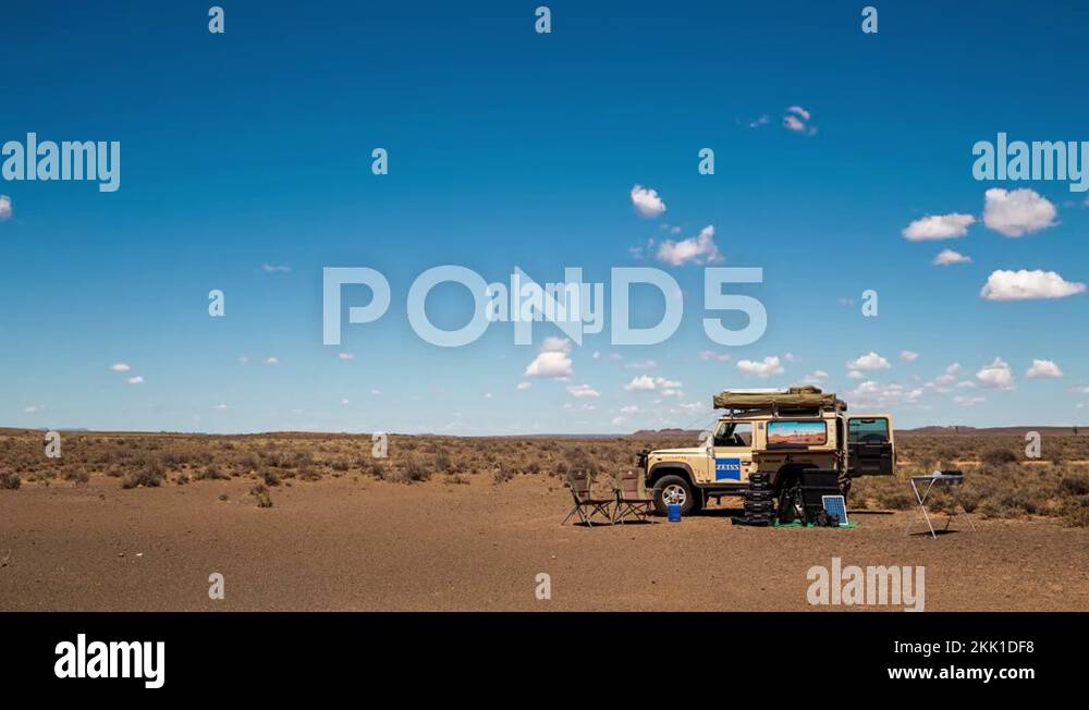 Static stop motion timelapse of safari vehicle with rooftop tent and ...