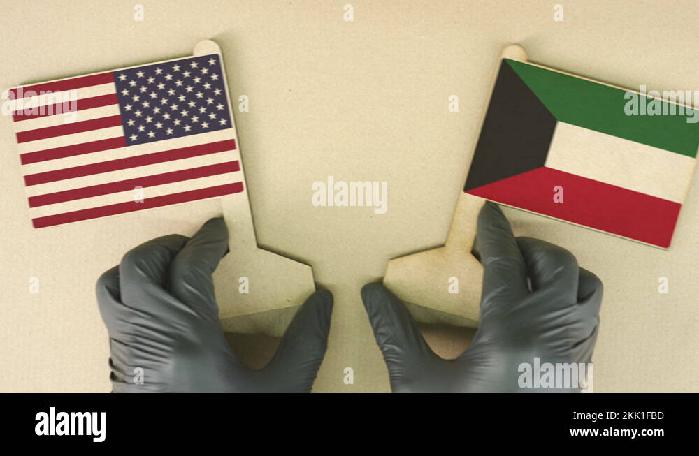 Flags of the USA and Kuwait made of cardboard on the desk Stock Video ...