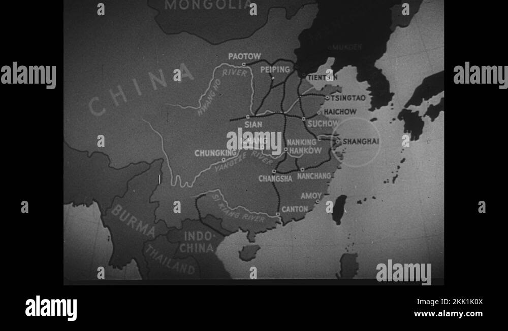 1940s China: Soldiers walk through rubble of city. Map of China. City ...