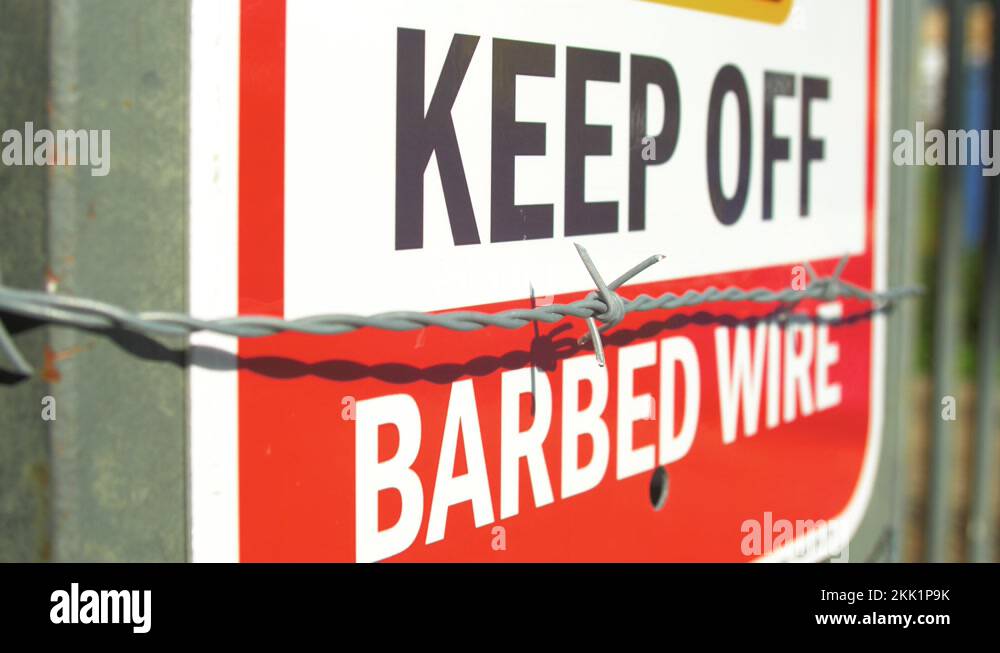 Razor wire fence warning sign Stock Videos & Footage - HD and 4K Video ...