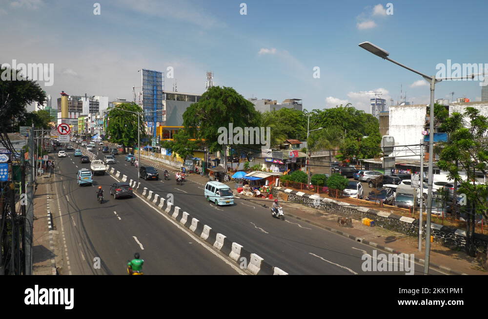 jakarta city traffic street pedestrian bridge top slow motion 4k ...