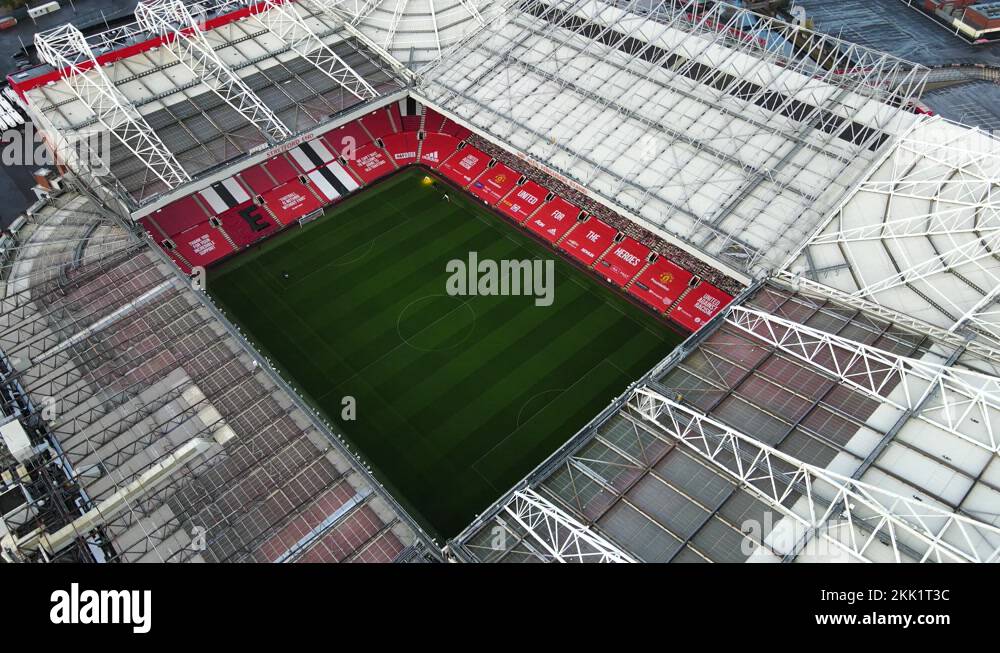 The pitch of Old Trafford football stadium from above Stock Video ...