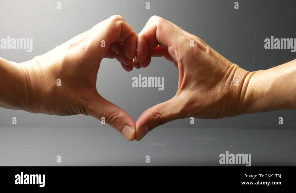 Hand heart symbol Stock Videos & Footage - HD and 4K Video Clips - Alamy
