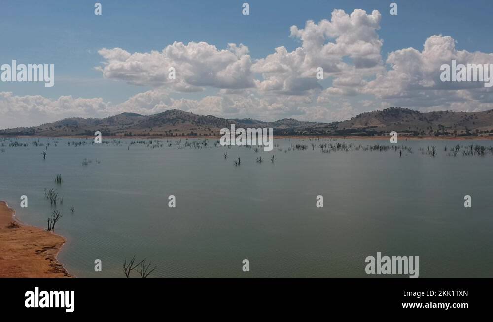 Effects of drought on lake water levels from birds eye view Stock Video ...