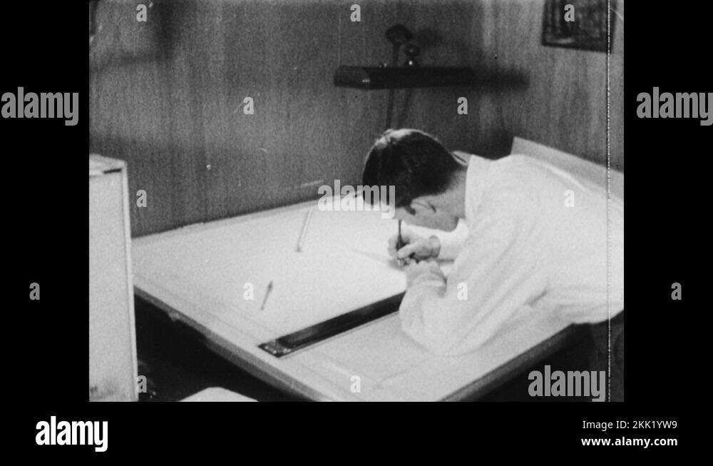 1960s: Man leans over drafting table, draws. Woman pulls blueprint from ...