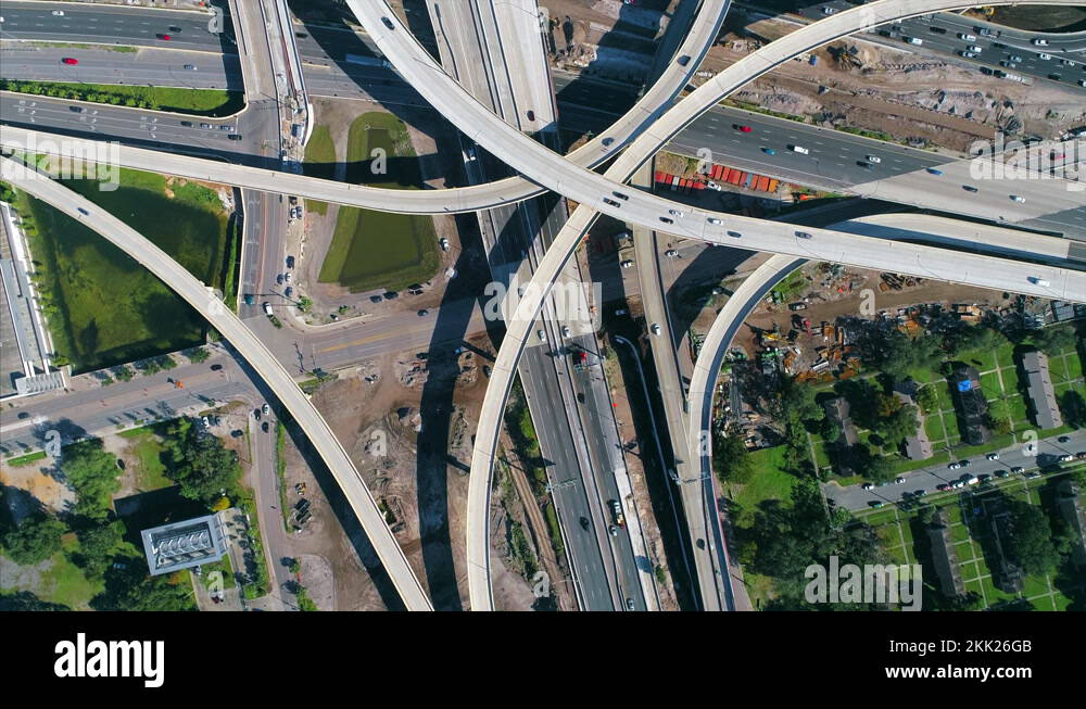 Top-down view of complex highway interchange with busy traffic Stock ...