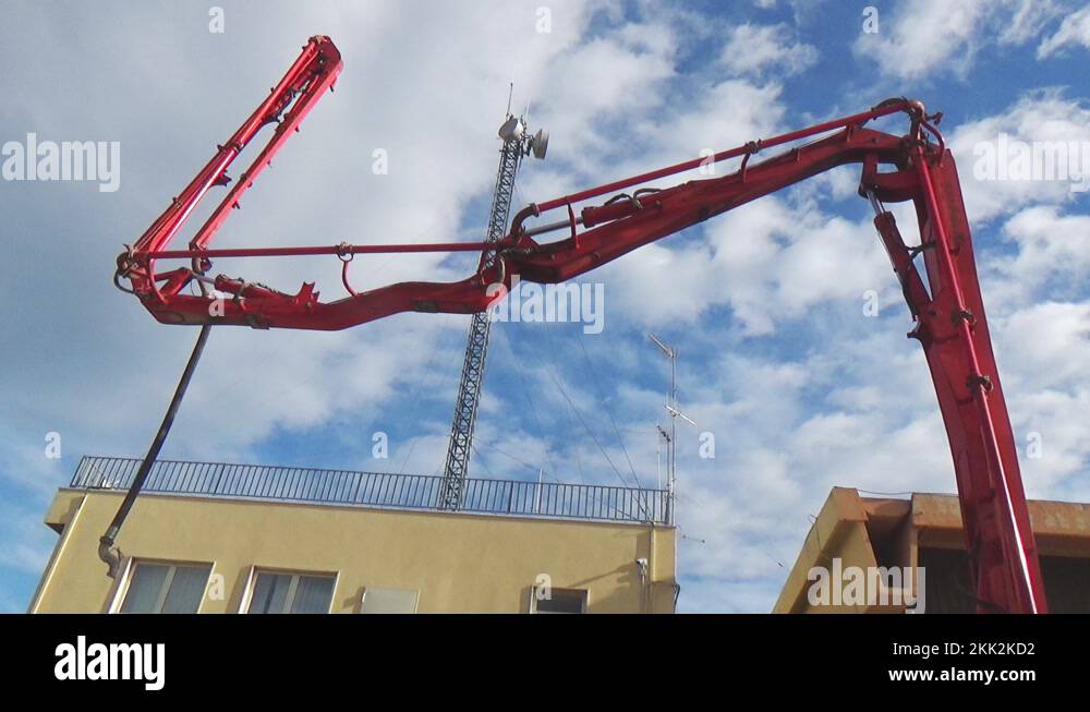 Concrete boom pump pouring concrete Stock Videos & Footage - HD and 4K ...
