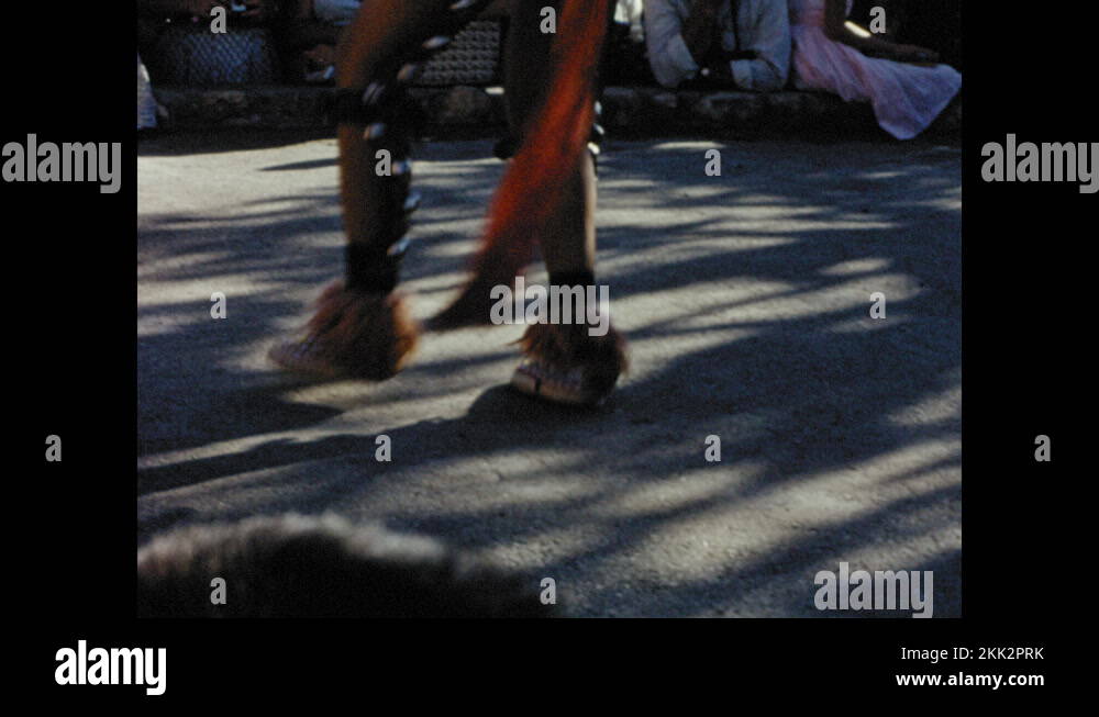 1950s: Native Americans perform traditional dances; Shirtless man hauls ...