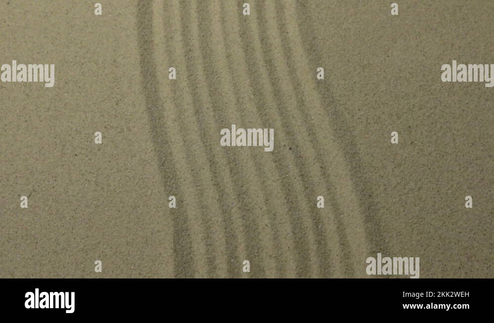 Curved smooth lines on smooth sand. Panorama Stock Video Footage - Alamy