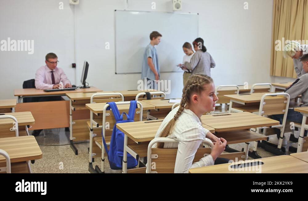 Three teenage girls talking and having fun, spending time together ...