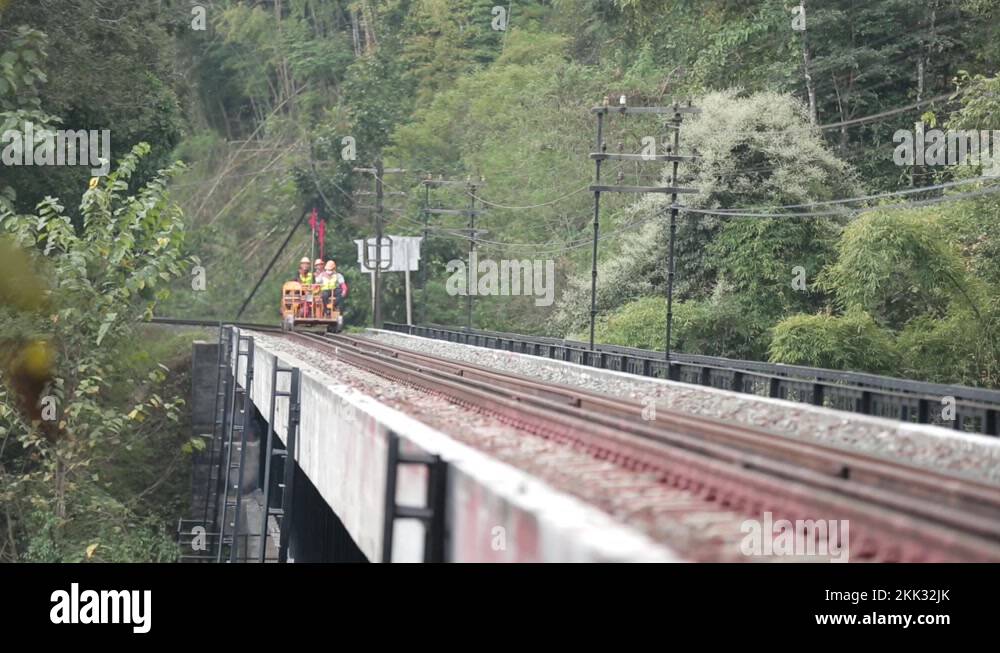 Men Wear Safety Helmet Riding Inspection Car On The Railway Stock Video ...
