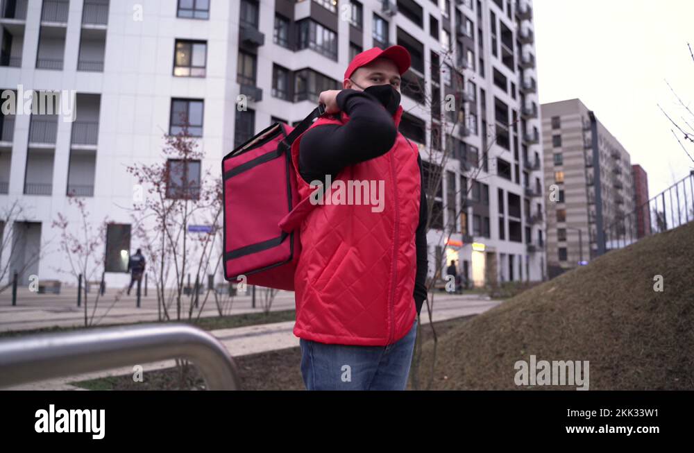 Delivery guy wearing red uniform Stock Videos & Footage - HD and 4K ...