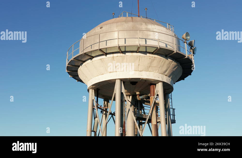 Water tower - elevated liquid storage tank. Metal reservoir for ...