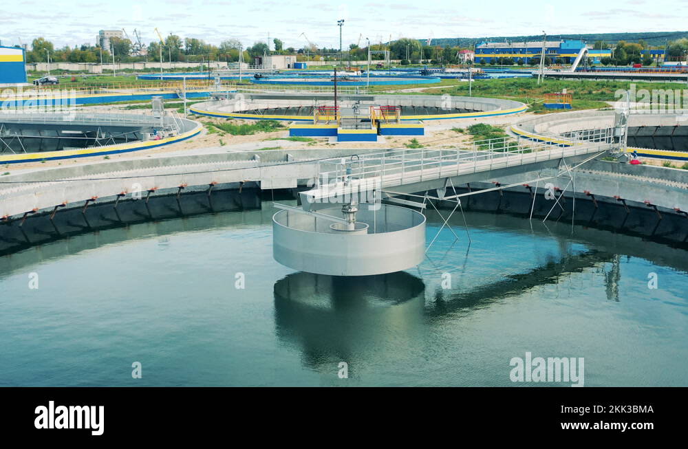 Big circular clarifiers at a wastewater treatment station. Drone shot ...