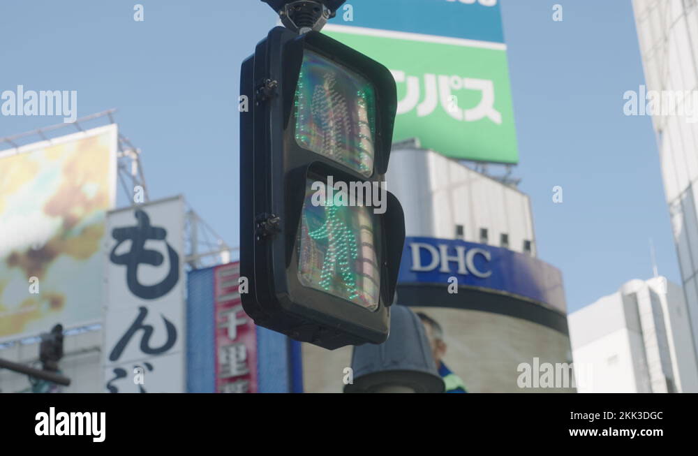 Traffic Light Changing From Red To Green With Advertising Billboards On ...