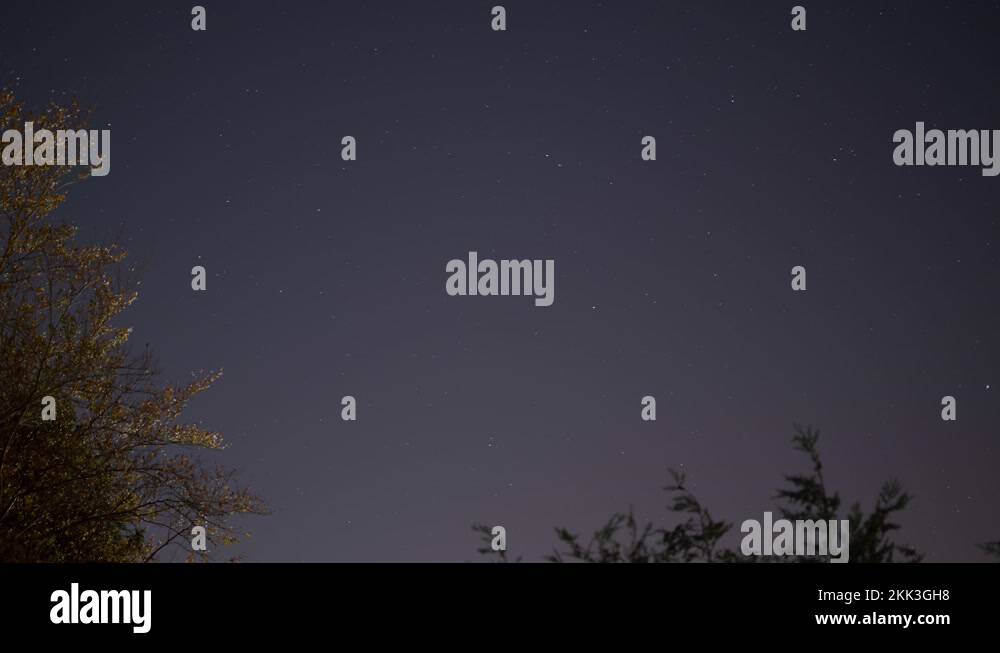 Faint lights in outer space caught in an astrophotography time lapse ...