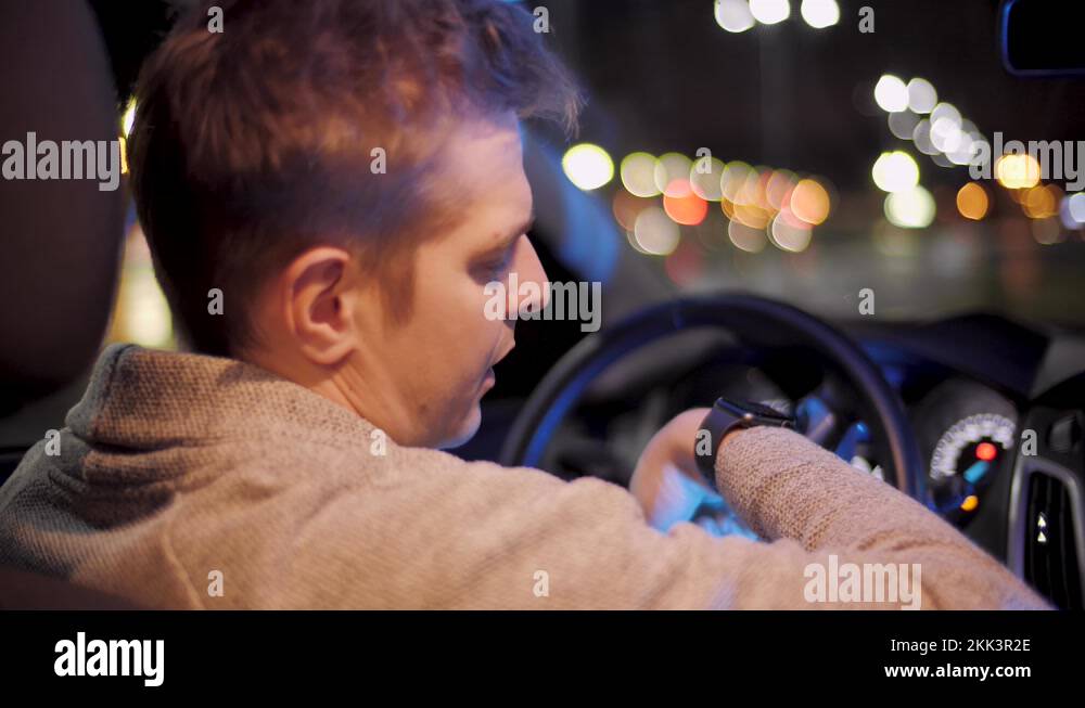 Man with smartwatch in a car using voice recorder recognition audio ...