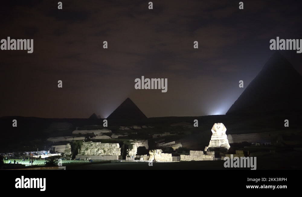 Night show Sphinx and great pyramids of Egypt with colorful light ...