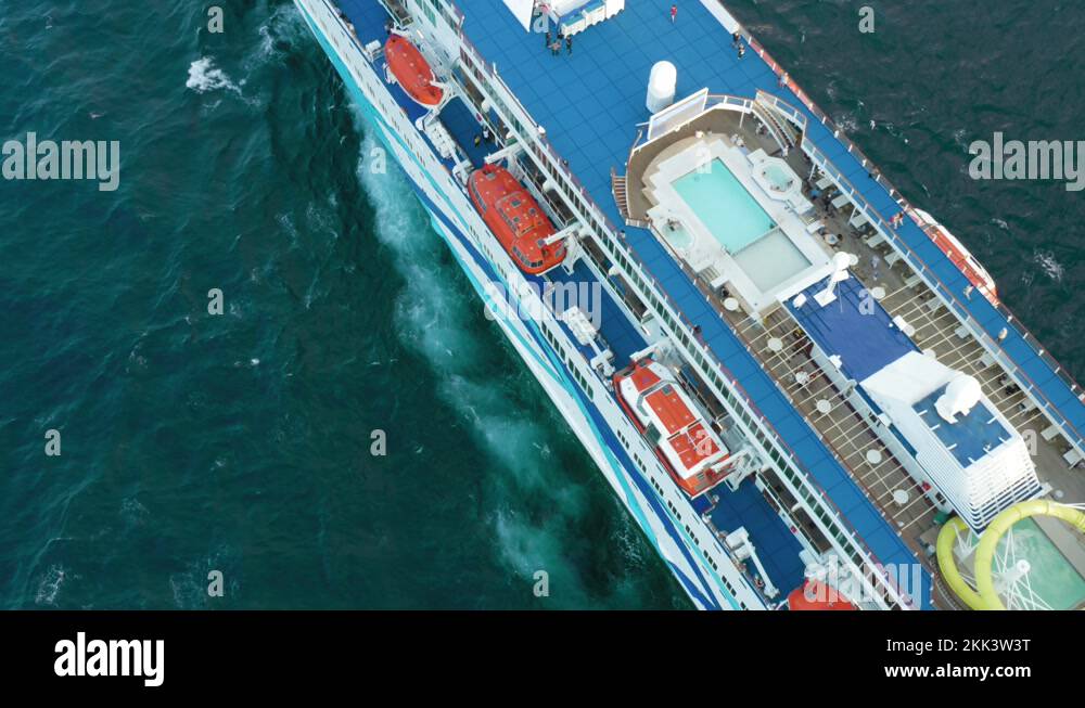 Cruise ship sails on the azure sea or ocean. Aerial top down view Stock ...