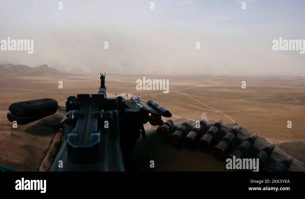 M2 Military Heavy Machine Gun against Desert Storm, Afghanistan Stock ...