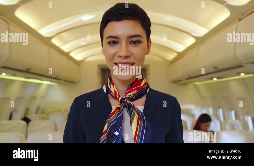 Cabin crew or air hostess working in airplane Stock Video Footage - Alamy