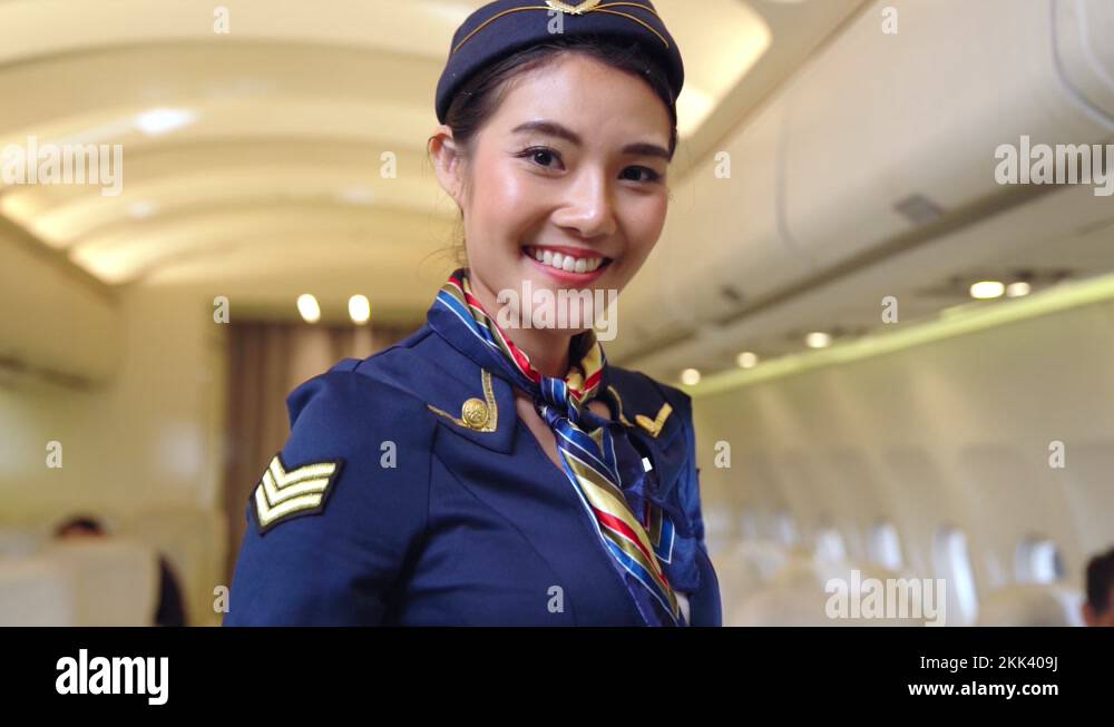 Cabin crew or air hostess working in airplane Stock Video Footage - Alamy