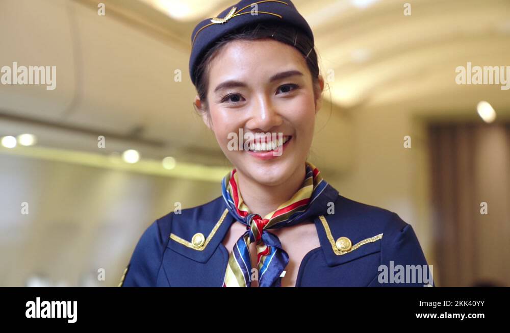 Cabin crew or air hostess working in airplane Stock Video Footage - Alamy