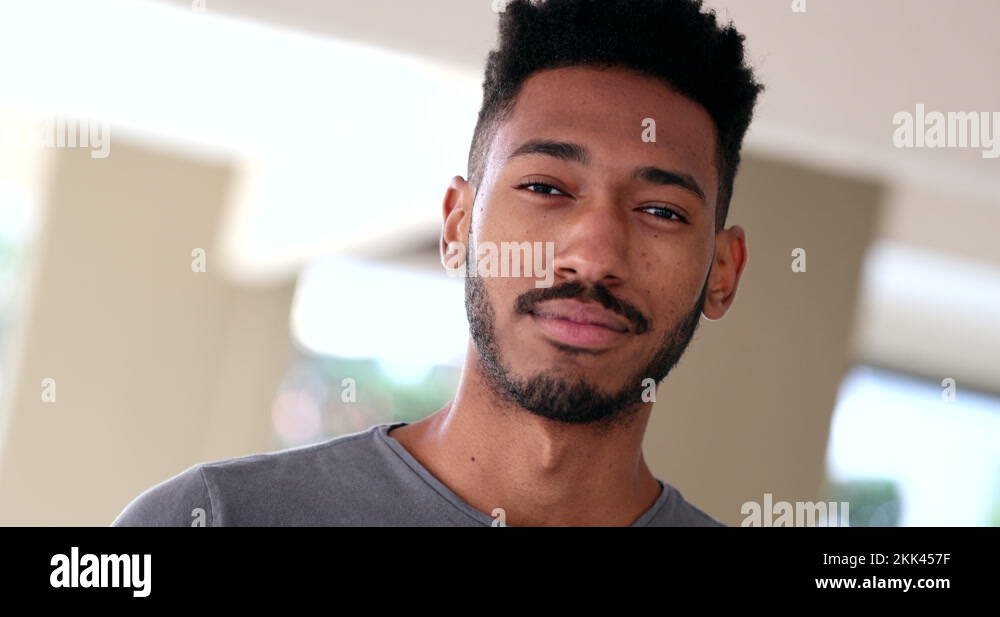Mixed race young man, black ethnicity person smiling portrait face ...