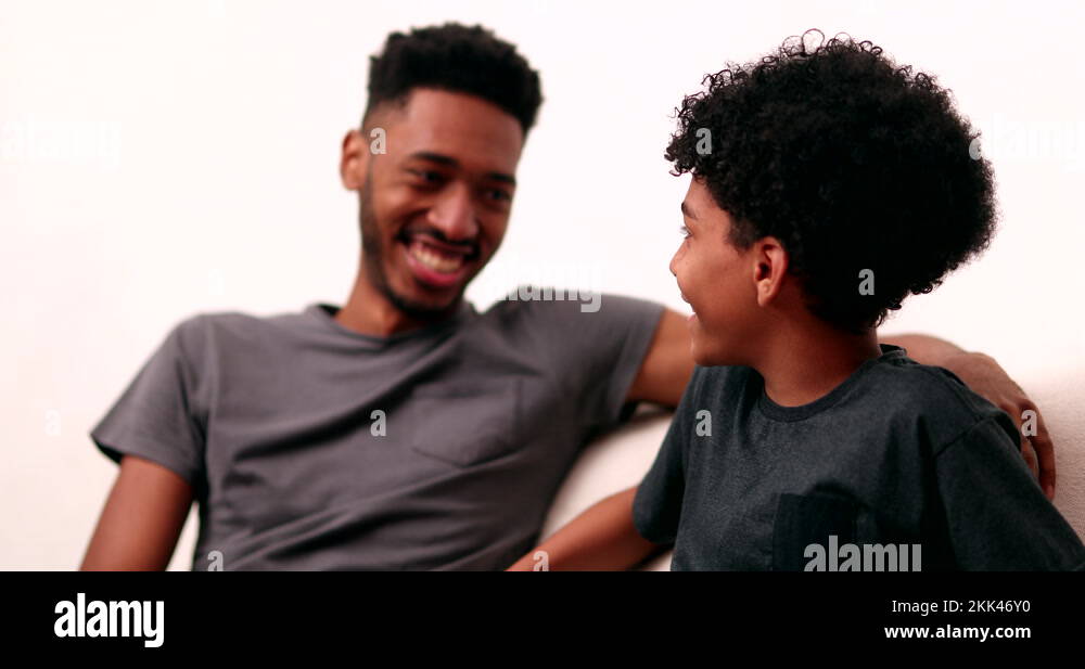 Two brothers talk interaction, black african siblings in conversation ...