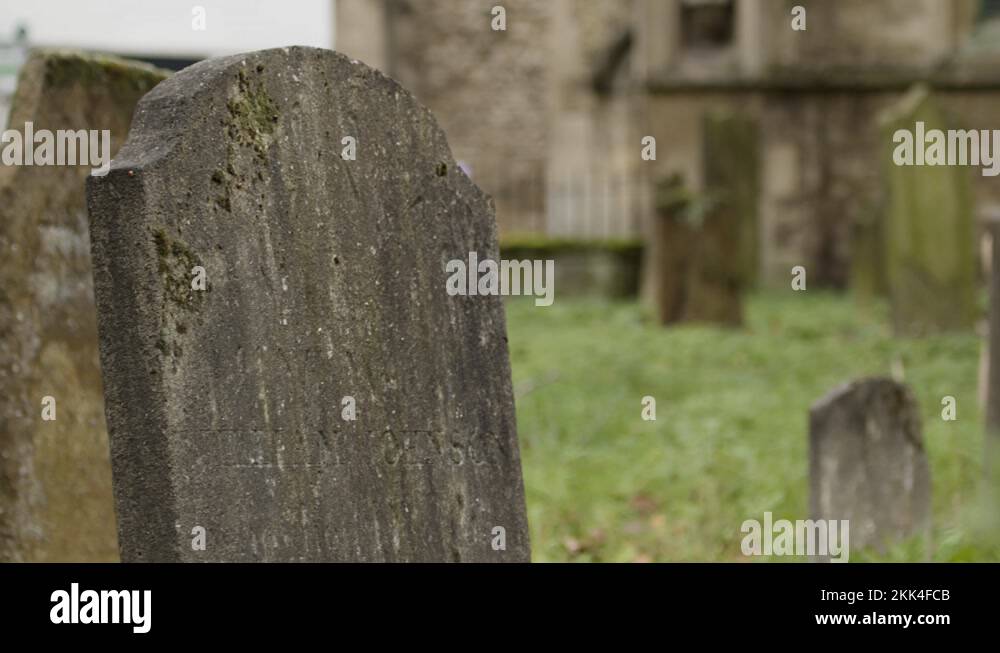 OXFORD, ENGLAND- 02/12/20: Panning Shot of Tombstone In Graveyard Stock ...