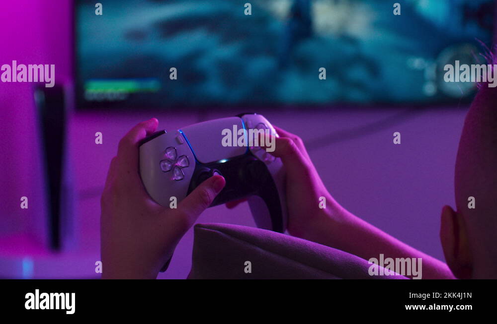 Kid playing Sony playstation 5 on TV screen, man play on next gen ...