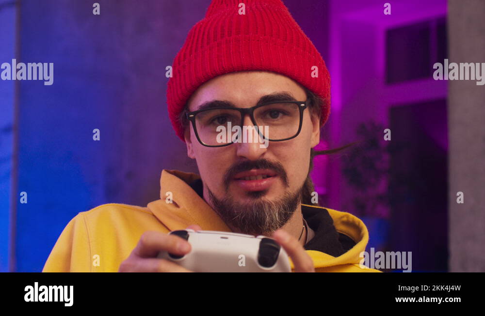 Excited man playing video games on modern console next gen 2020, new ...