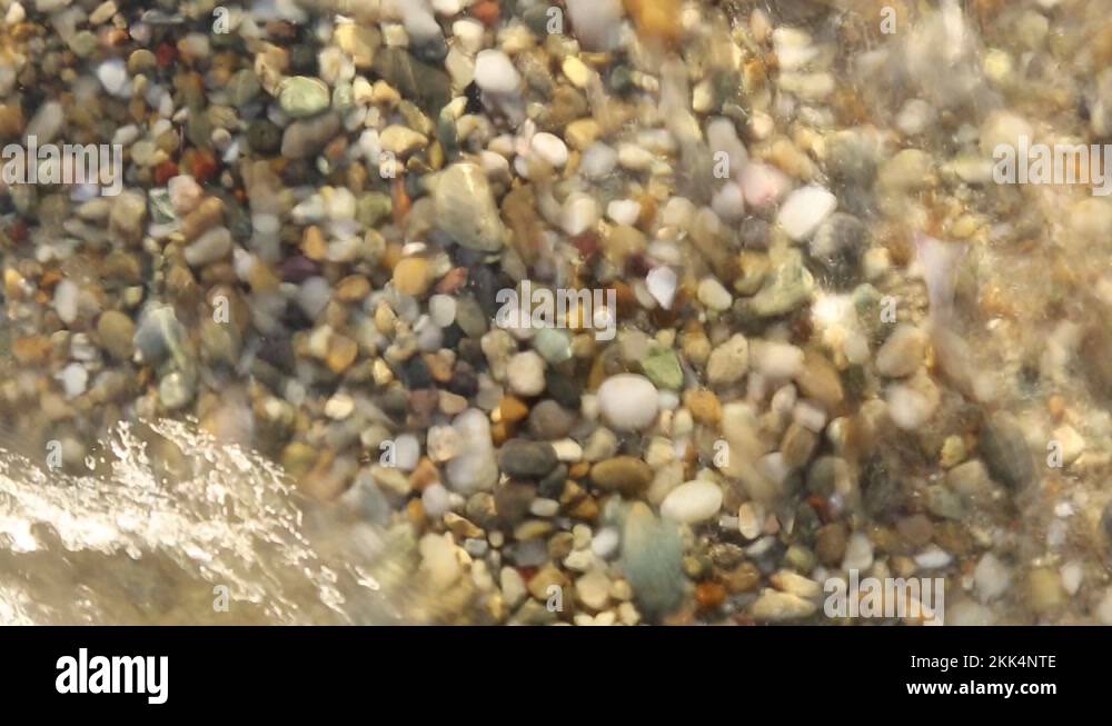 Small beach pebbles Stock Videos & Footage - HD and 4K Video Clips - Alamy