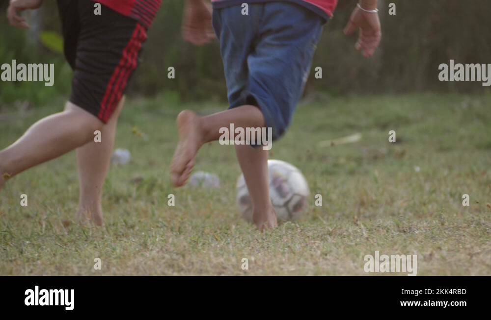 People play football on grass Stock Videos & Footage - HD and 4K Video ...