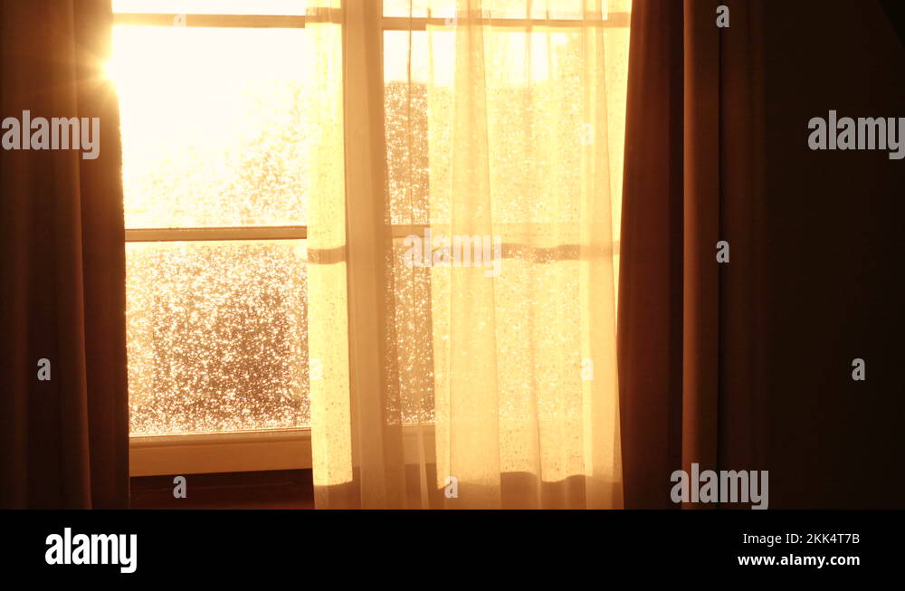 sunbeams through transparent curtain of opened window 3 Stock Video ...