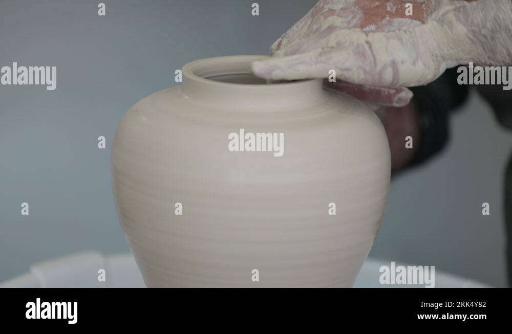 Potters wheel, hands forms clay pot on potter's wheel Stock Video ...