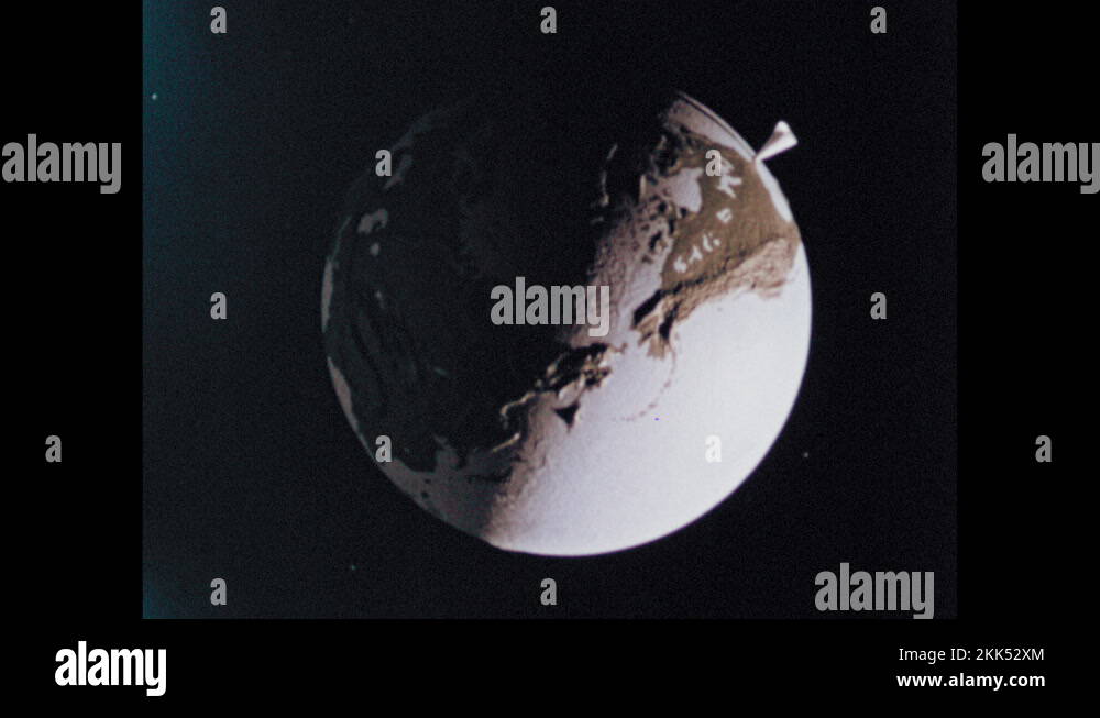 1960s: Looking down on model of Earth rotating on axis in space with ...