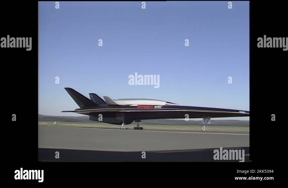 1990s: Aircraft on runway. Animated plane flies into orbit. Computer ...