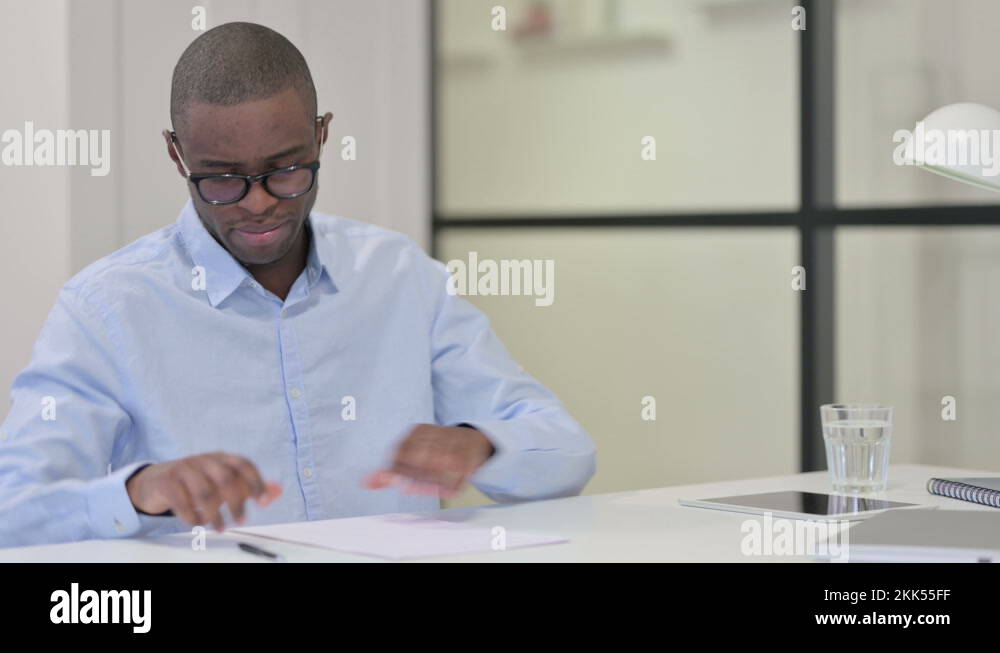 African Man Tearing Papers, Unable to Write at Work Stock Video Footage ...