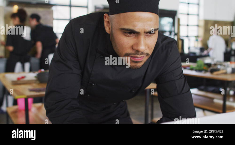 Mixed race male chef using Stock Videos & Footage - HD and 4K Video ...
