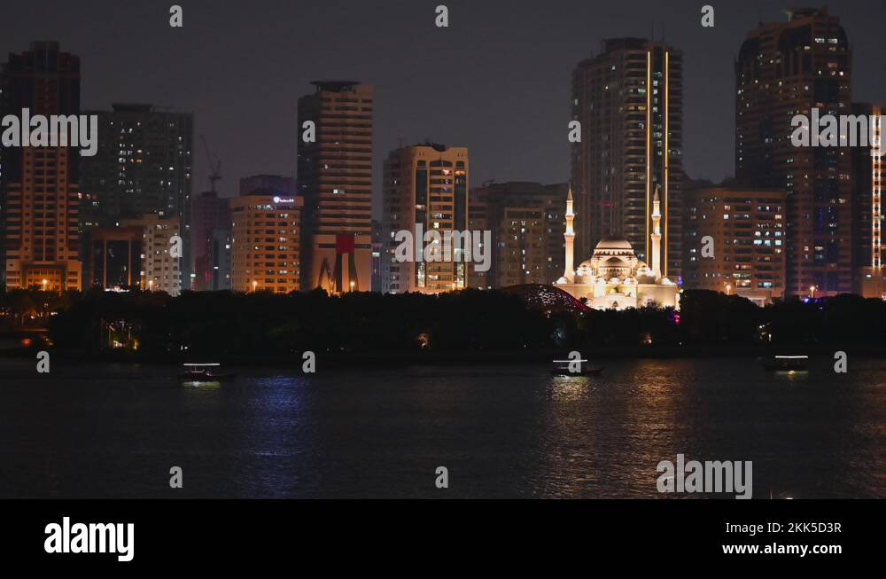 Night view of the iconic Sharjah's Al Noor Mosque, Khalid lake and Al ...