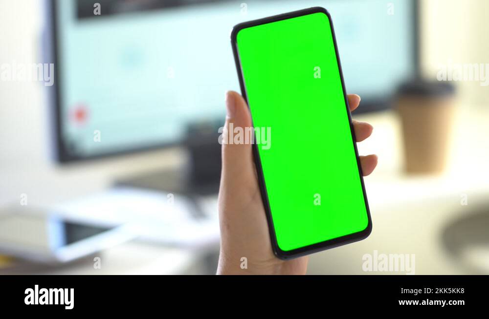 Handheld Camera: Back View of Brunette Man Holding Chroma Key Green ...